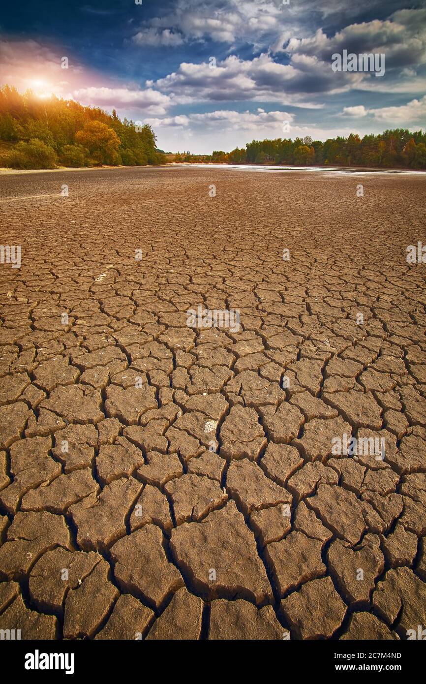 Land with dry and cracked ground. Climate change, dry lake Stock Photo ...