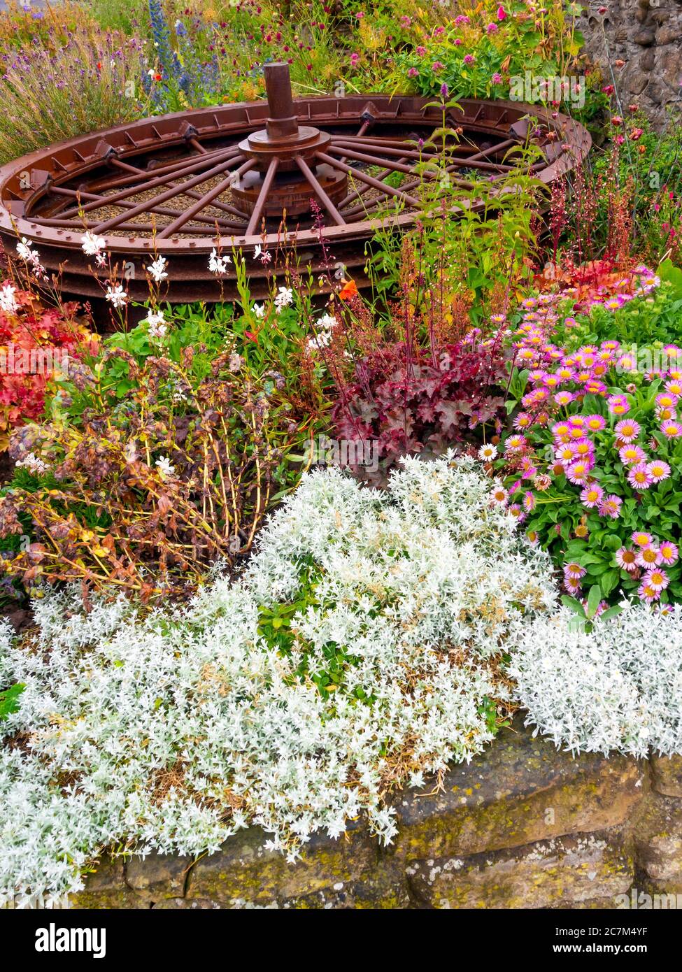 Fossil garden with the original winding wheel from the nearby cliff ...