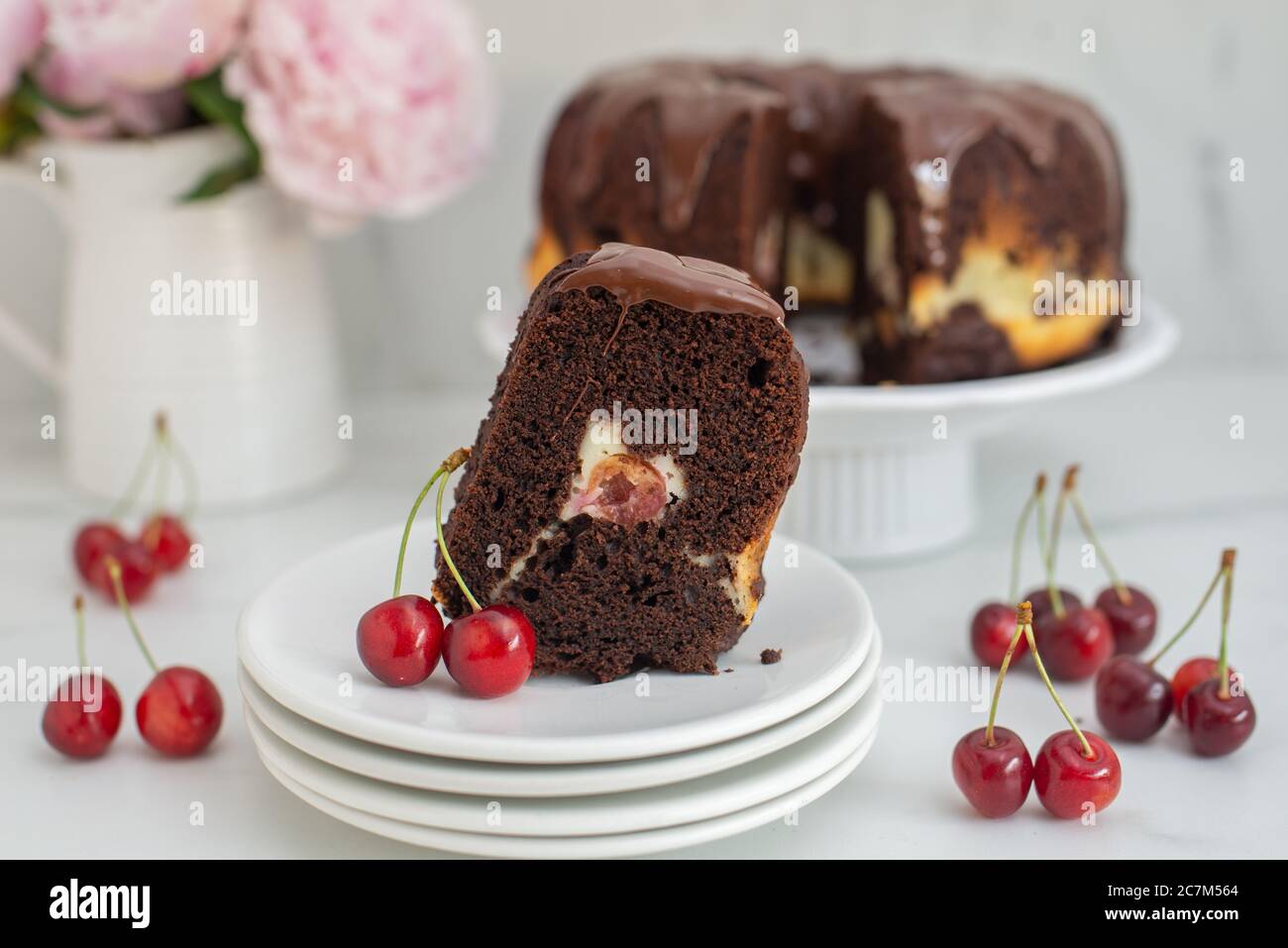 chocolate cherry sponge cake with chocolate frosting Stock Photo - Alamy