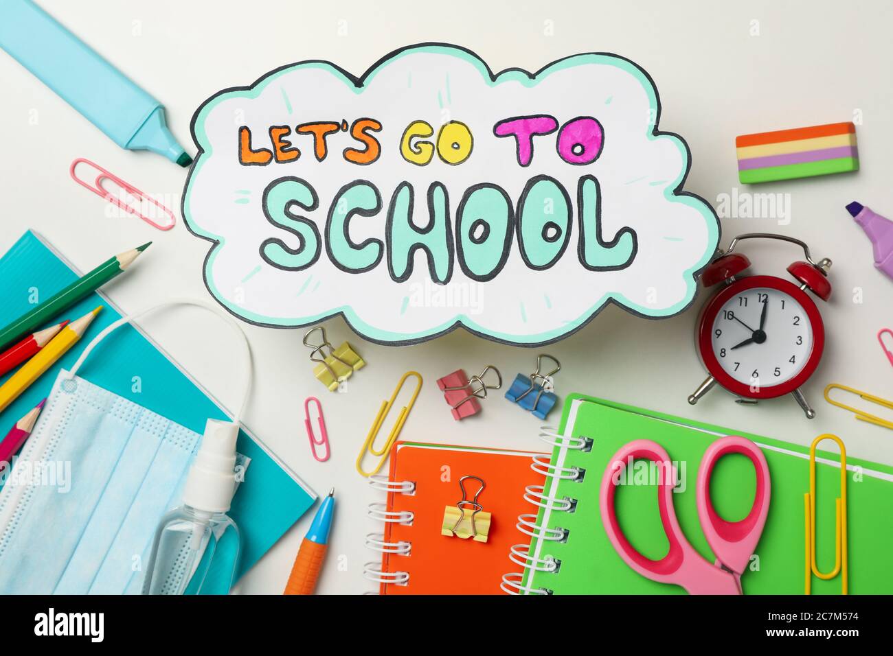 Text Let's go to school, school supplies, medical mask and sanitizer on ...