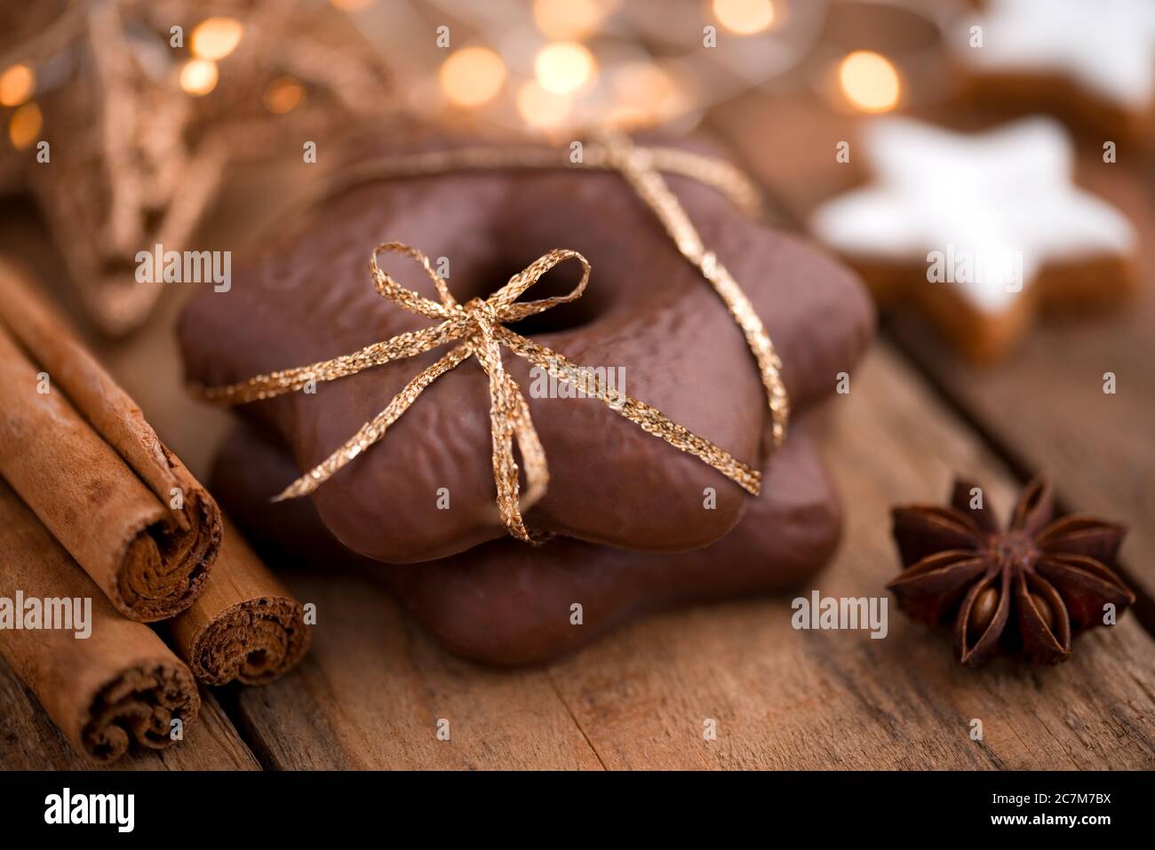 Christmas still life with gingerbread stars and spices on wood Stock ...