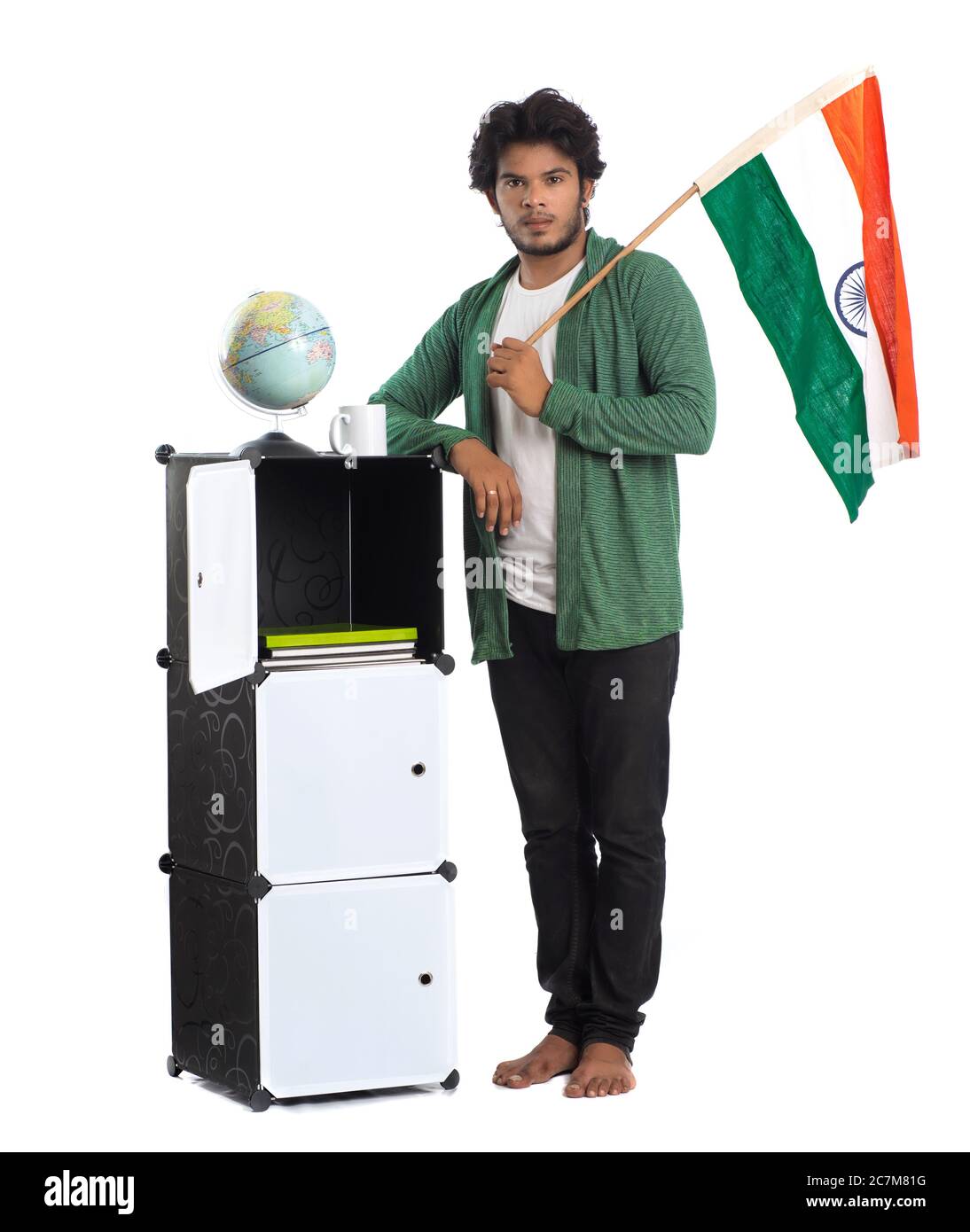 Young man with Indian flag or tricolor with world globe on white ...