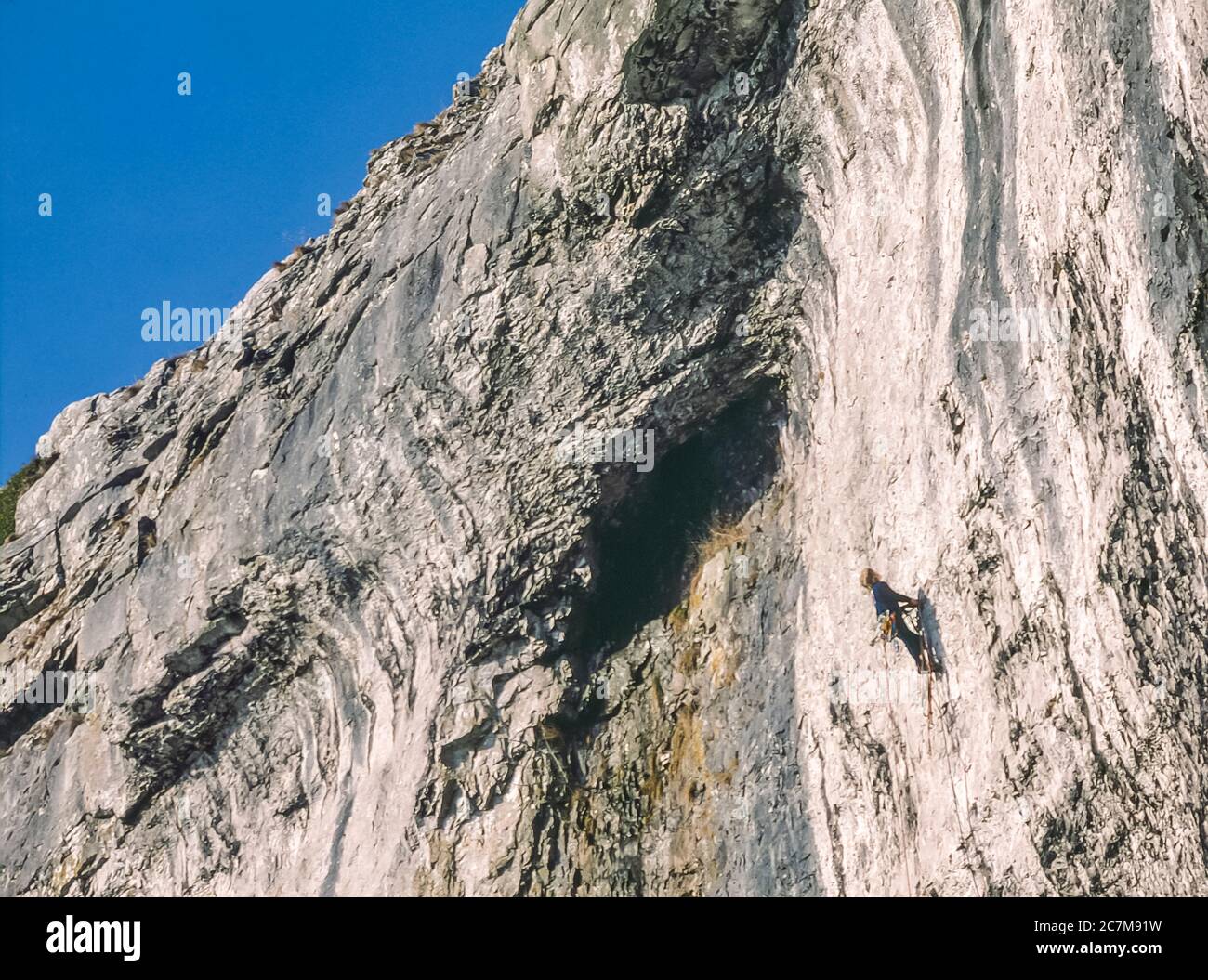 Rock climbers in action at the geological-geographical wonder of Malham ...