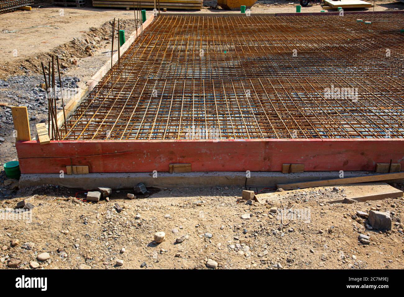 Rusty reinforcement steel mesh mats prepared for a base plate on a ...