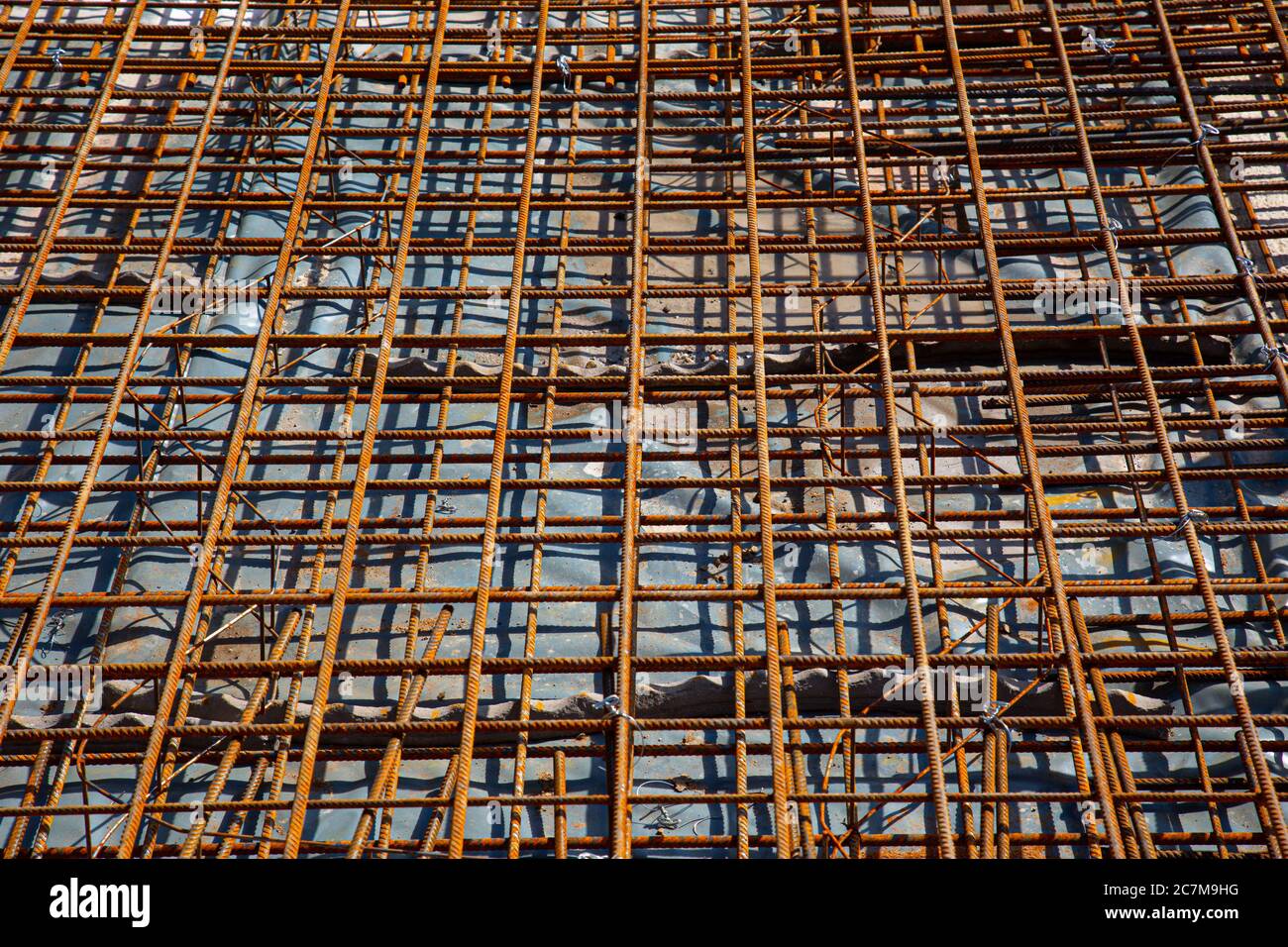 Rusty reinforcement steel mesh mats prepared for a base plate on a ...