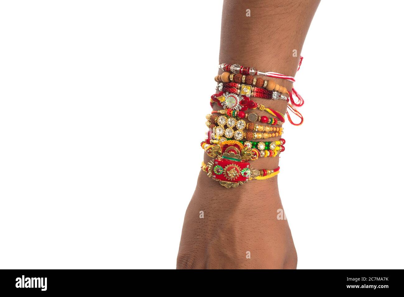 Young men showing rakhi on his hand on an occasion of Raksha Bandhan ...