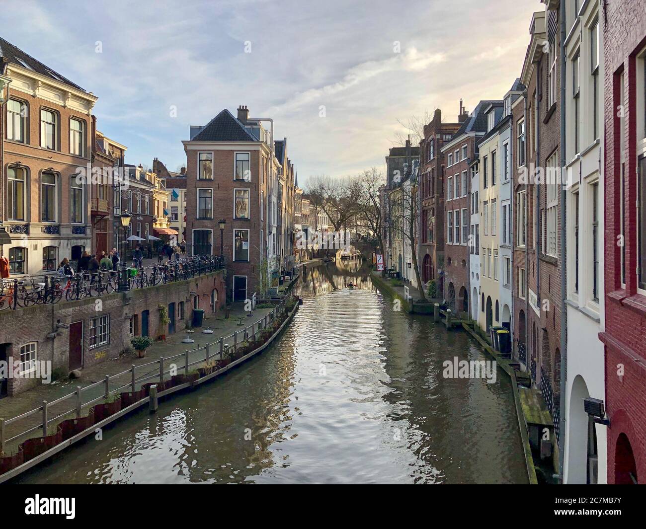 Dom Tower Canal in Utrecht Netherlands with a scenery of sunset in a ...