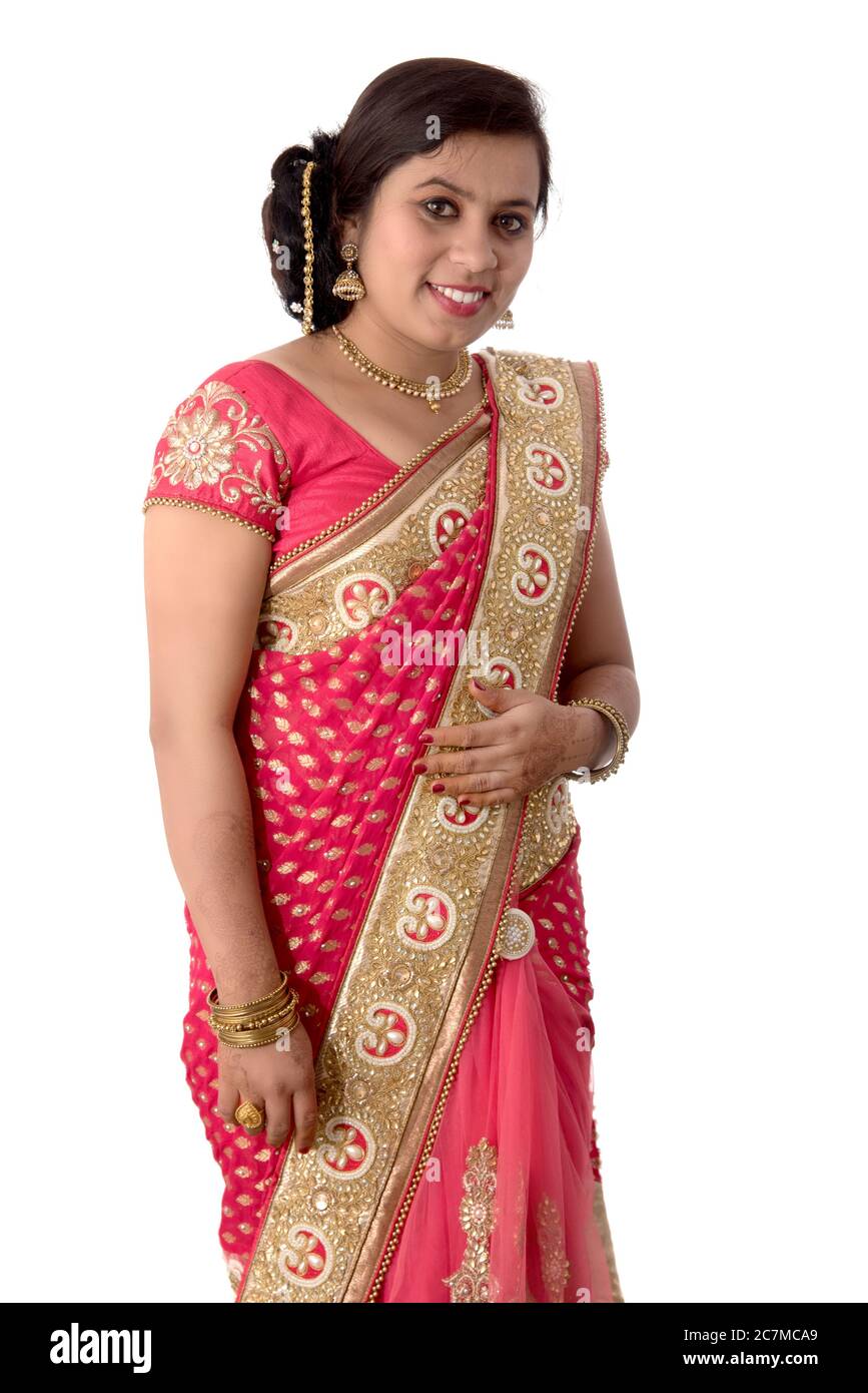 Beautiful young girl posing in Indian traditional saree on white ...