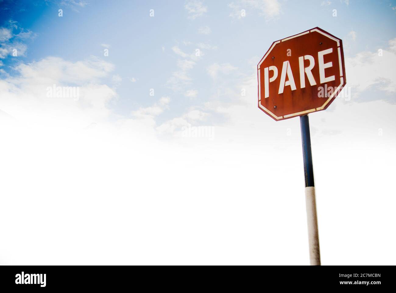 Spanish stop sign against blue sky, Cusco, Peru, South America Stock ...
