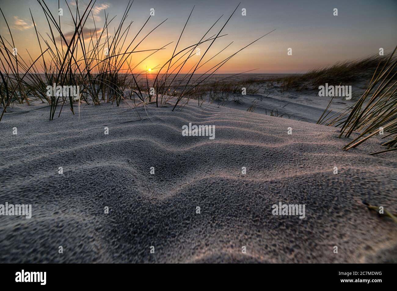 Beautiful sandy beach with a sea during the low tide Stock Photo - Alamy