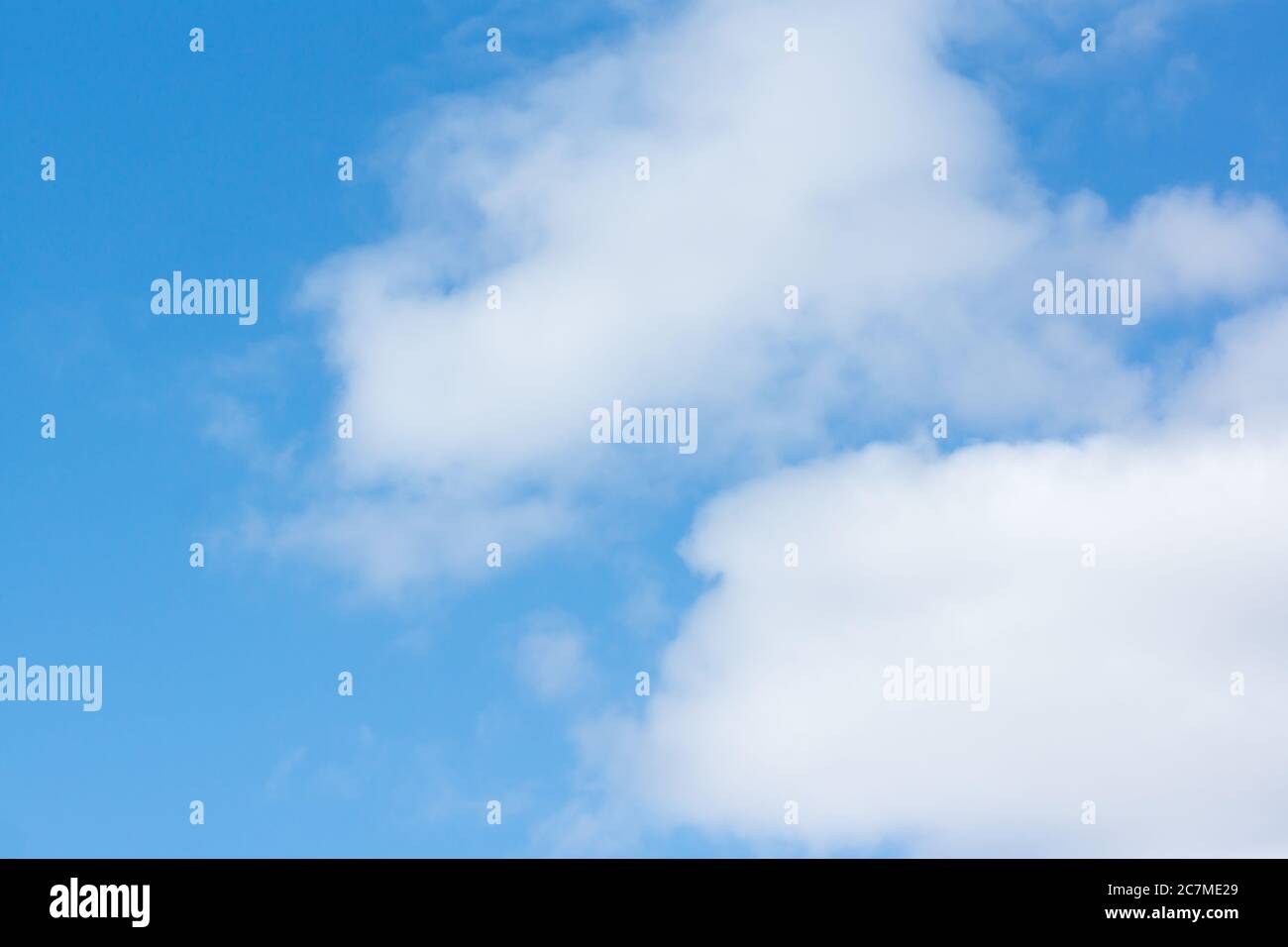 blue sky with flying white light clouds Stock Photo - Alamy