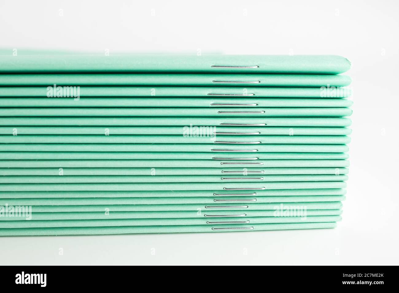 stack of thin student notebooks for elementary school Stock Photo - Alamy