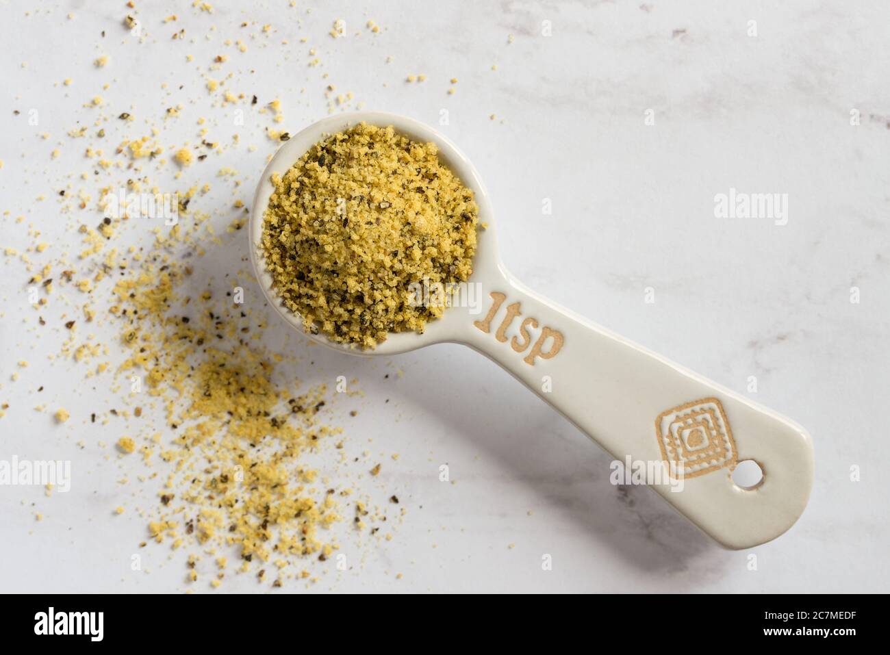 Lemon Pepper Seasoning Spilled from a Teaspoon Stock Photo - Alamy