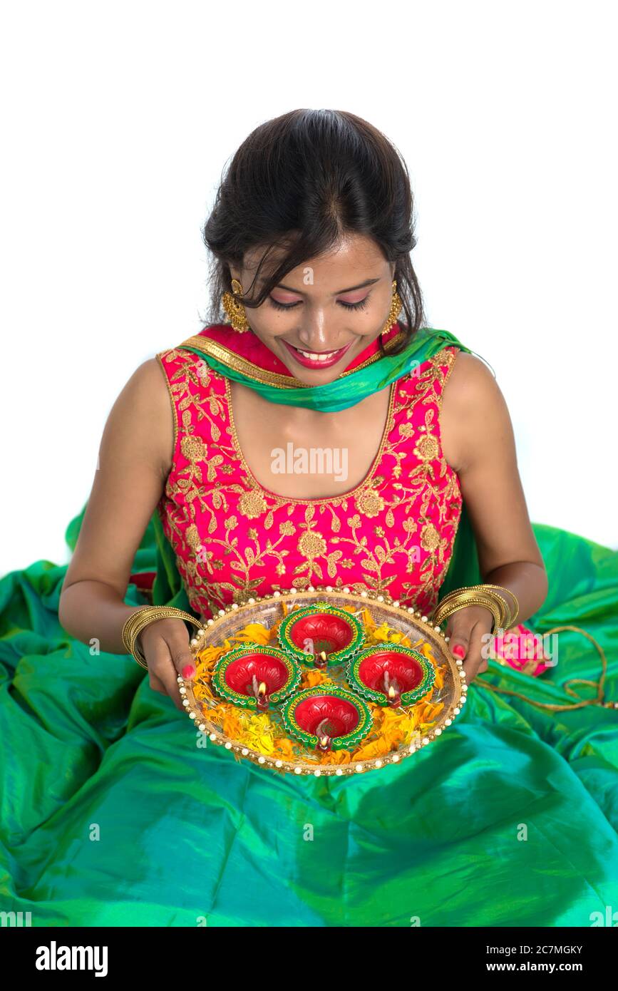 Portrait of a Indian Traditional Girl holding Diya, Girl Celebrating ...