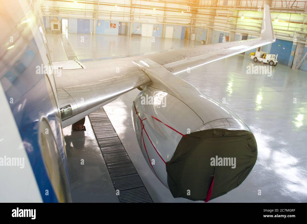 Engine of the airplane in the cover on repair service maintenance Stock ...