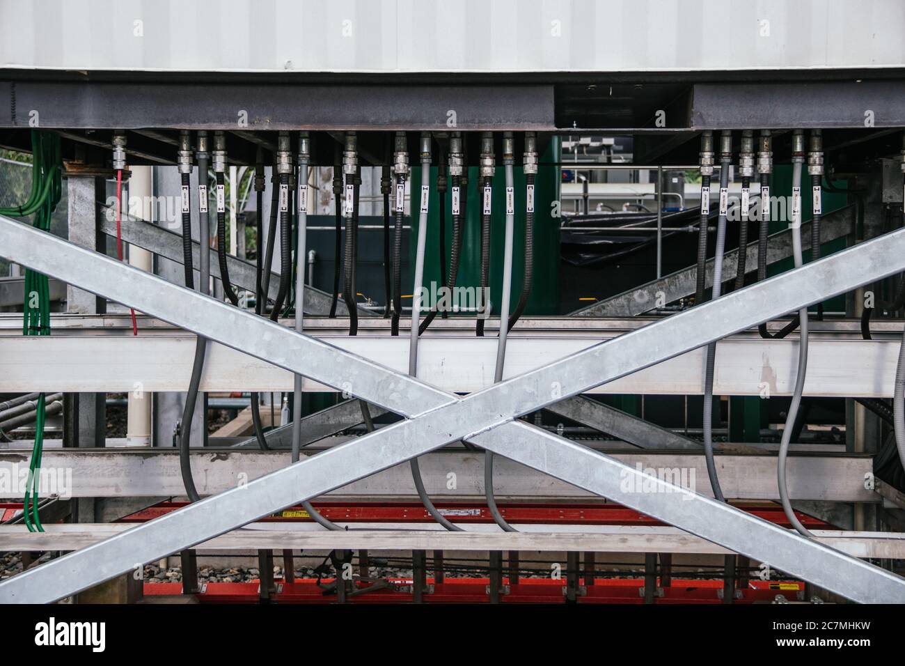 Shot of X-shaped obstacle near the factory wires - industrial concept ...