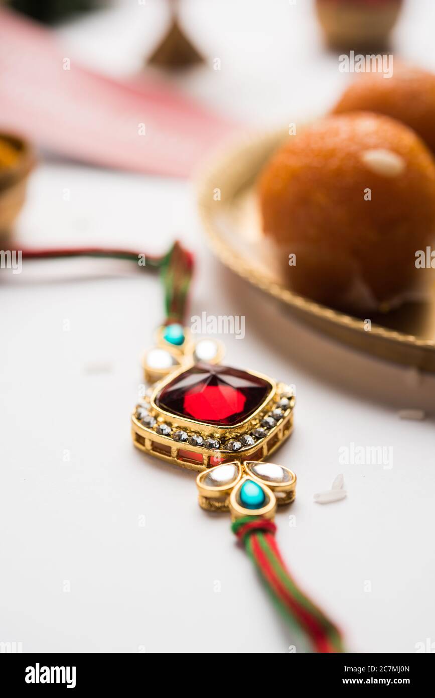 Raksha Bandhan / Rakshabandhan Rakhi with Haldi Kumkum rice, sweet ...