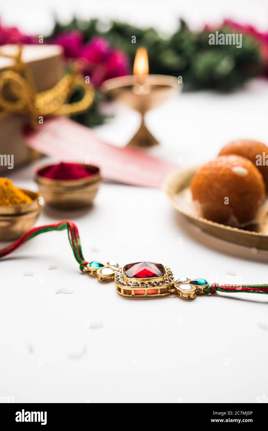 Raksha Bandhan / Rakshabandhan Rakhi with Haldi Kumkum rice, sweet ...