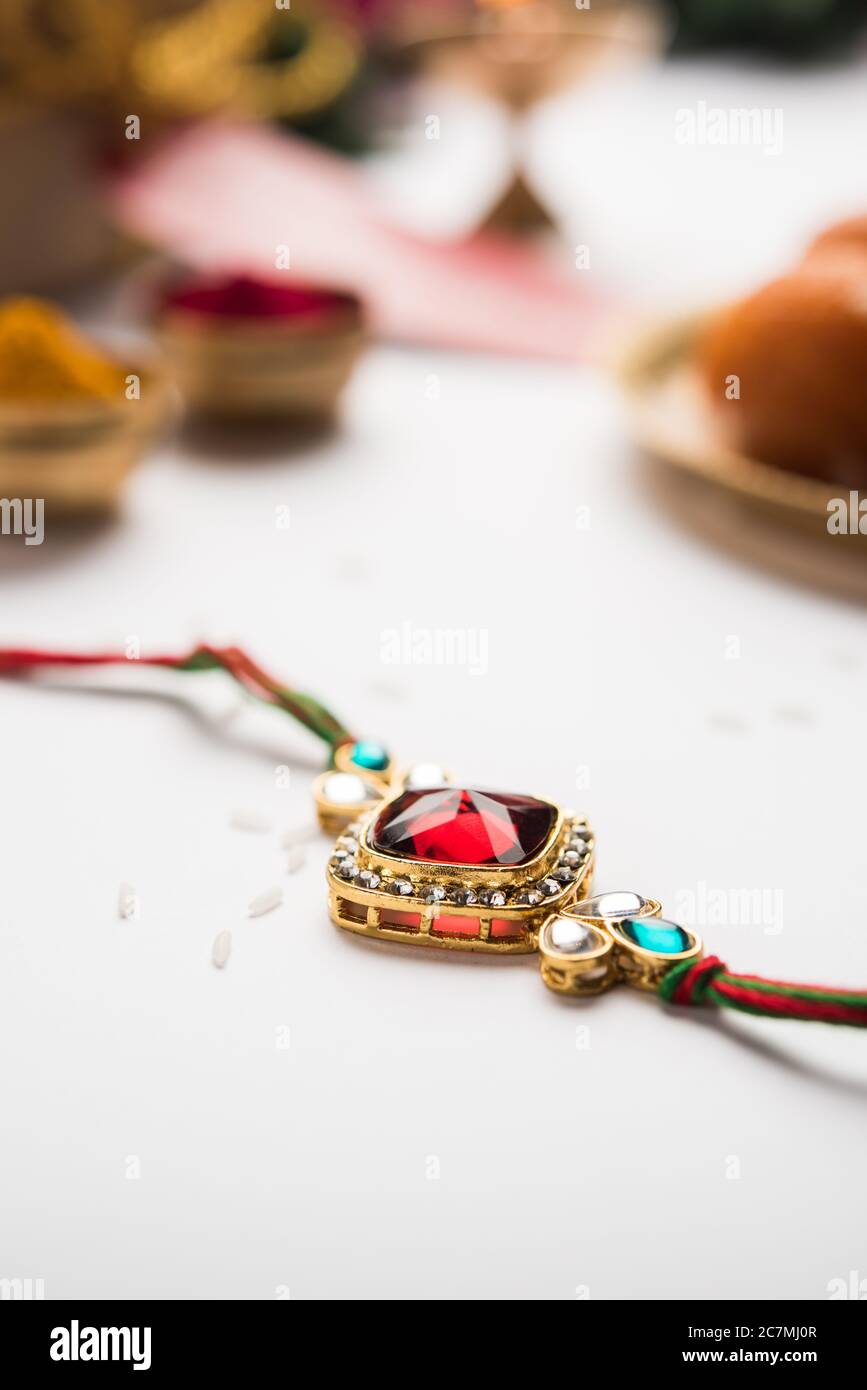 Raksha Bandhan / Rakshabandhan Rakhi with Haldi Kumkum rice, sweet ...