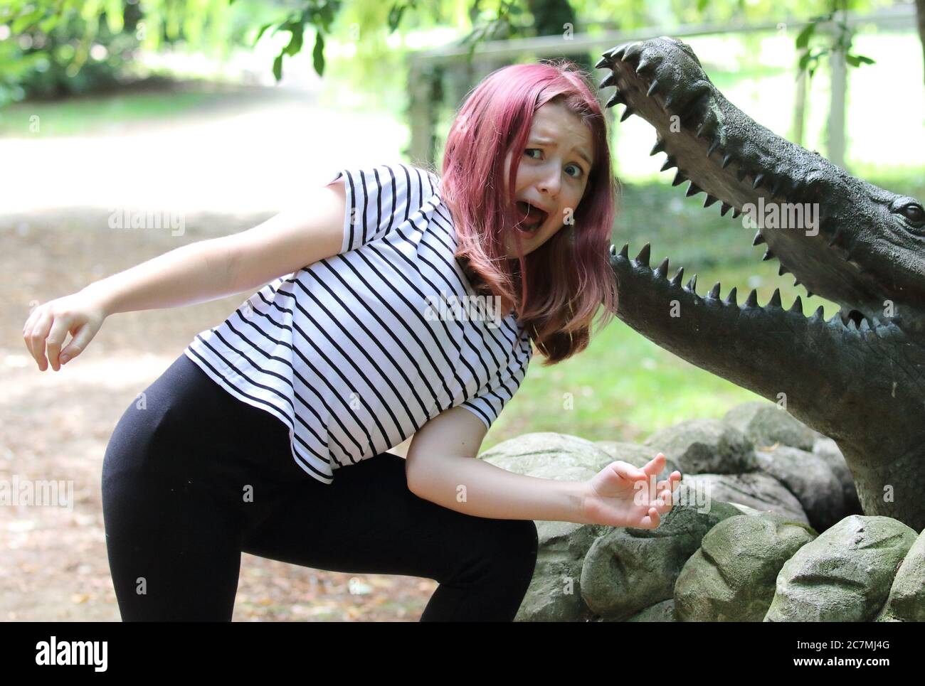 Cambridge, UK. 17th July, 2020. A girl pretends to looks scared as she ...