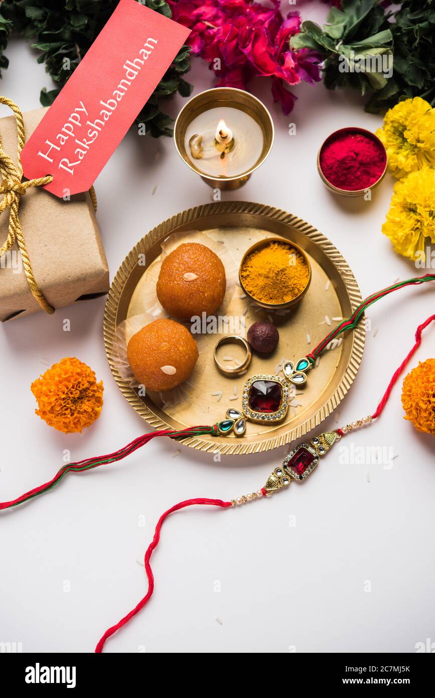 Raksha Bandhan / Rakshabandhan Rakhi with Haldi Kumkum rice, sweet ...
