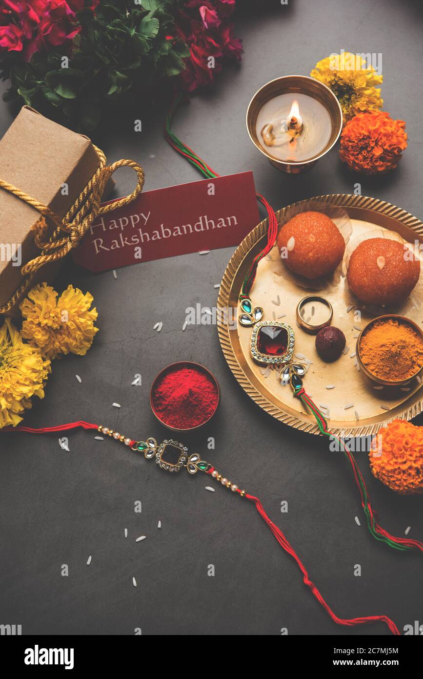 Raksha Bandhan / Rakshabandhan Rakhi with Haldi Kumkum rice, sweet ...