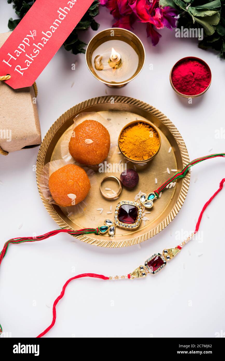 Raksha Bandhan / Rakshabandhan Rakhi with Haldi Kumkum rice, sweet ...