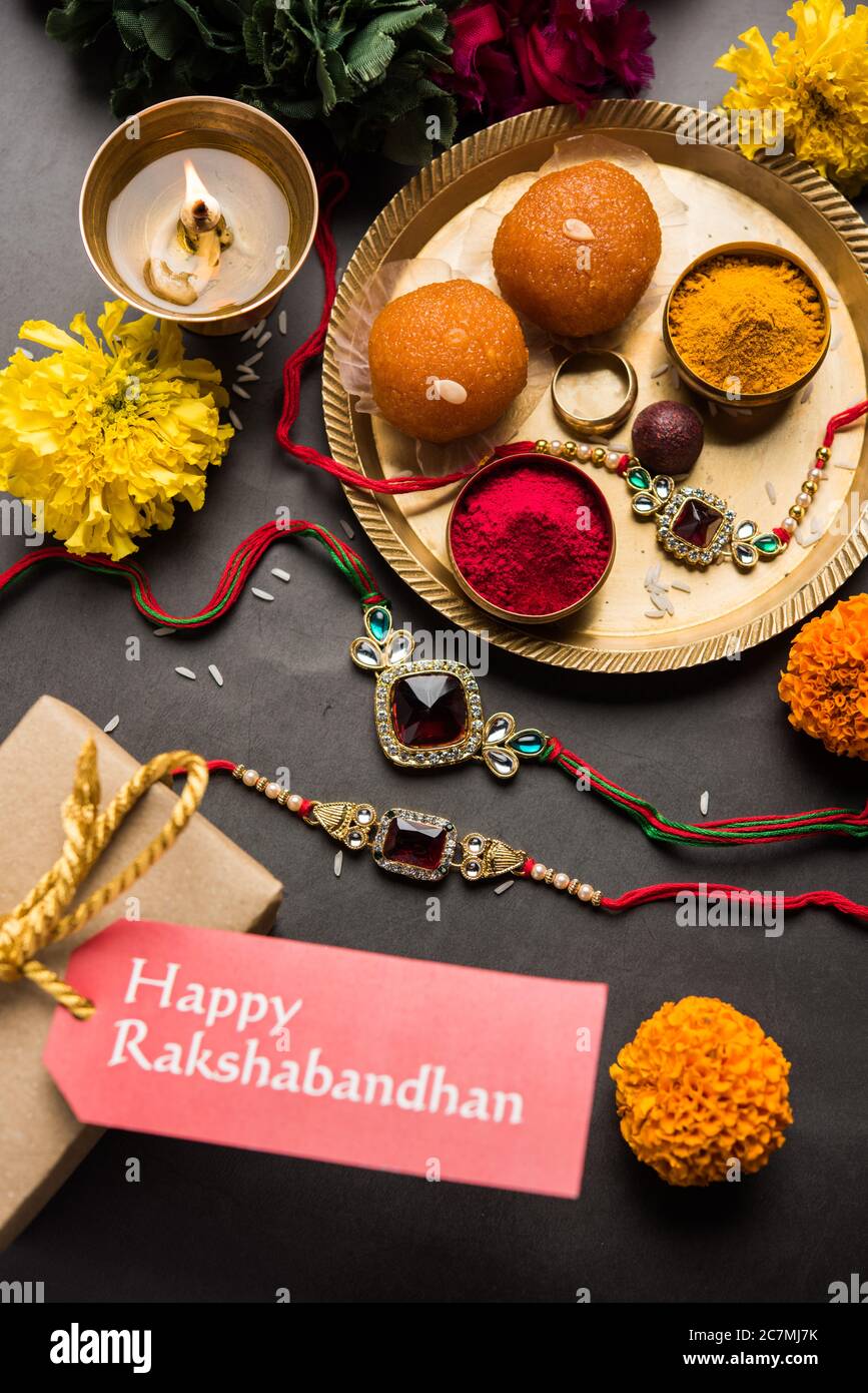 Raksha Bandhan / Rakshabandhan Rakhi with Haldi Kumkum rice, sweet ...
