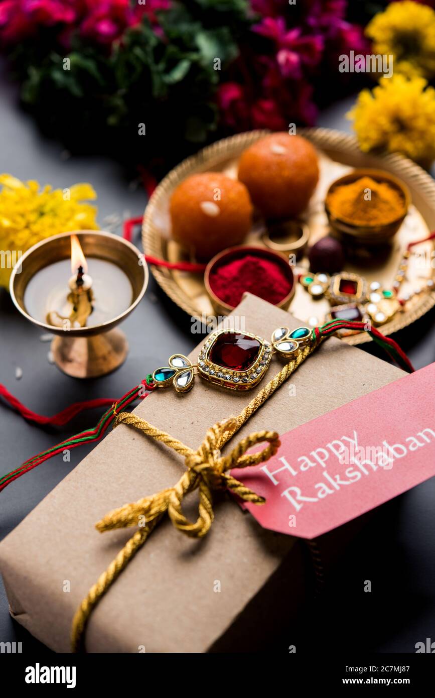 Raksha Bandhan / Rakshabandhan Rakhi with Haldi Kumkum rice, sweet ...