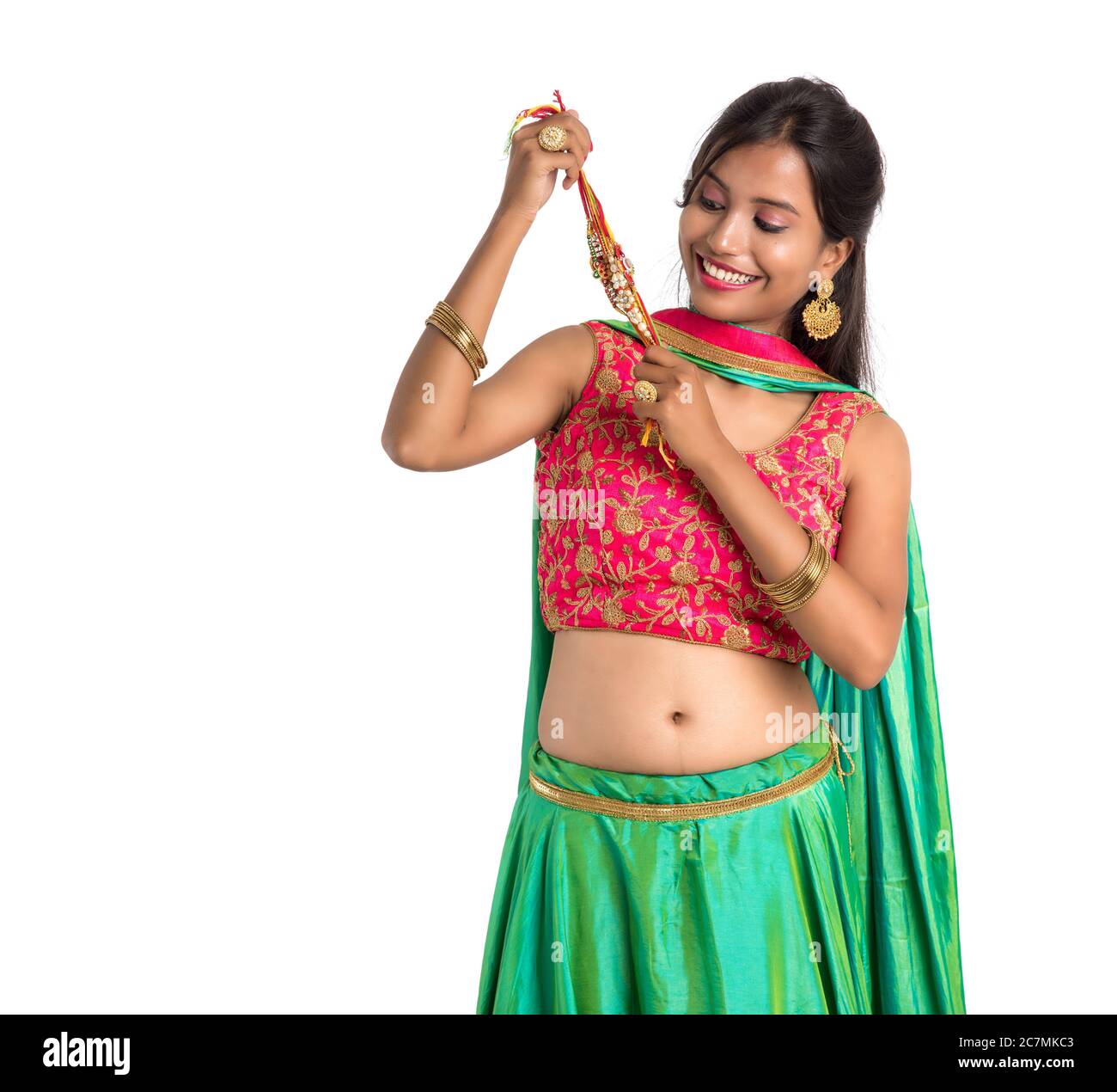 Beautiful Girl Showing Rakhi On Occasion Of Raksha Bandhan On A White Background Sister Tie