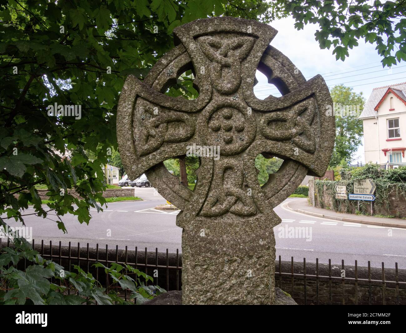 Celtic cross on gravestone outside Parish Church, Holsworthy, Devon, UK ...