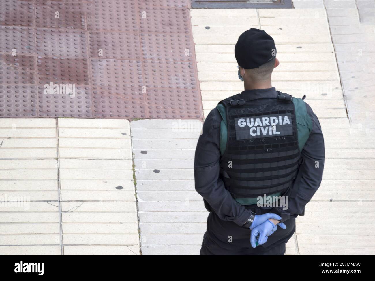 Spanish civil guard police officer guards a checkpoint organized by the ...