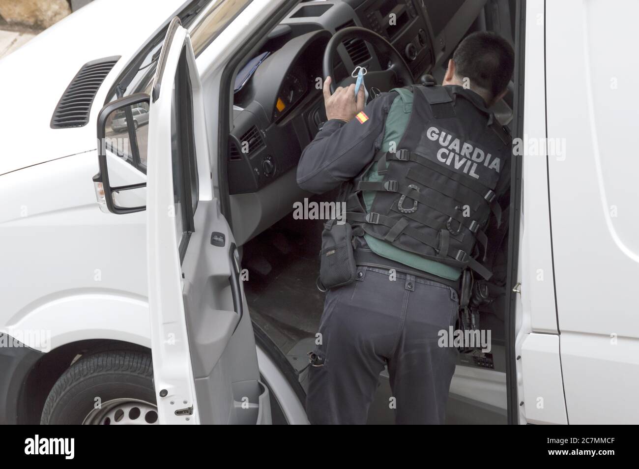 Spanish civil guard police officer guards a checkpoint organized by the ...