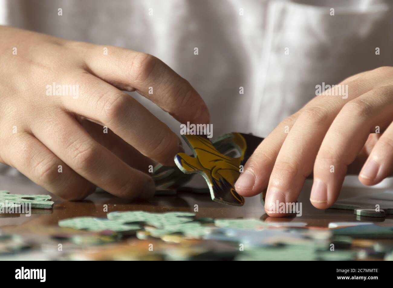 Children making a puzzle hi-res stock photography and images - Alamy