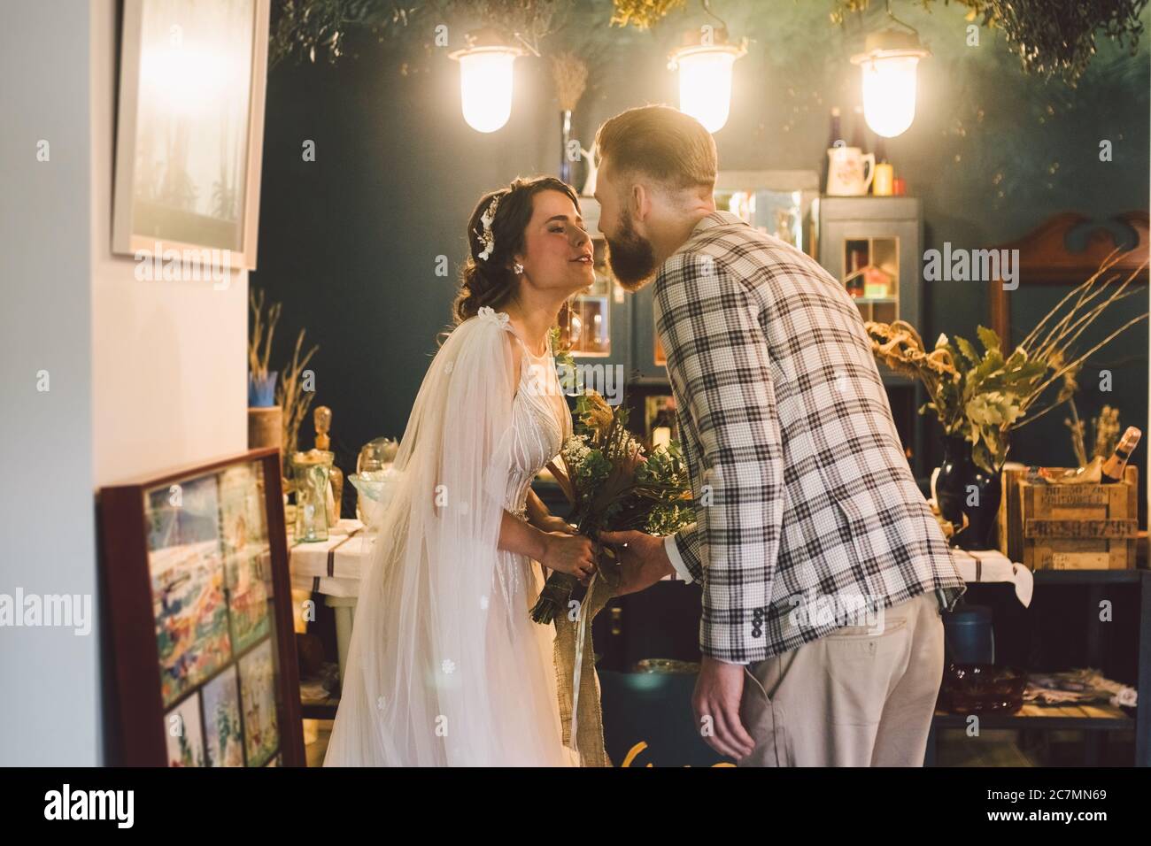 First look moment at wedding before ceremony starts. Bride and groom ...