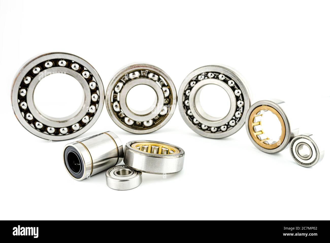 Background made of several ball bearings, isolated on a white ...