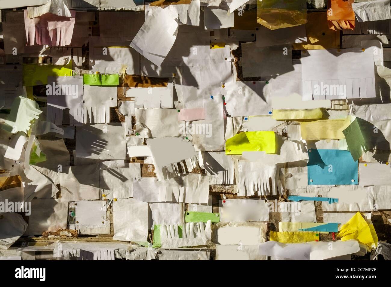 Old bulletin board full of notes Stock Photo - Alamy