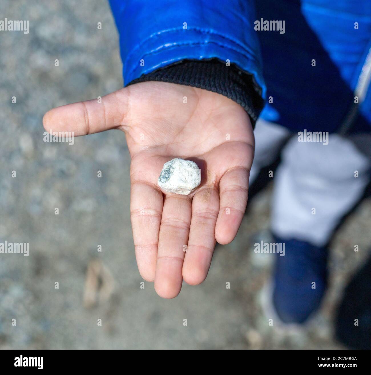 Stone in hand hi-res stock photography and images - Alamy