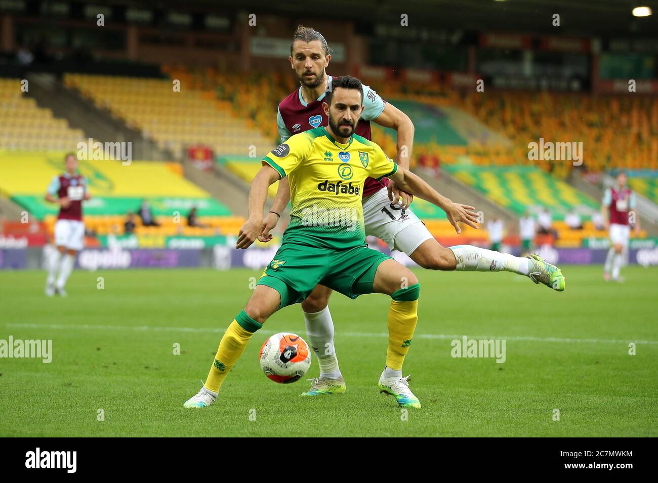 Burnley's Jay Rodriguez (right) and Norwich City's Sam Byram battle for ...