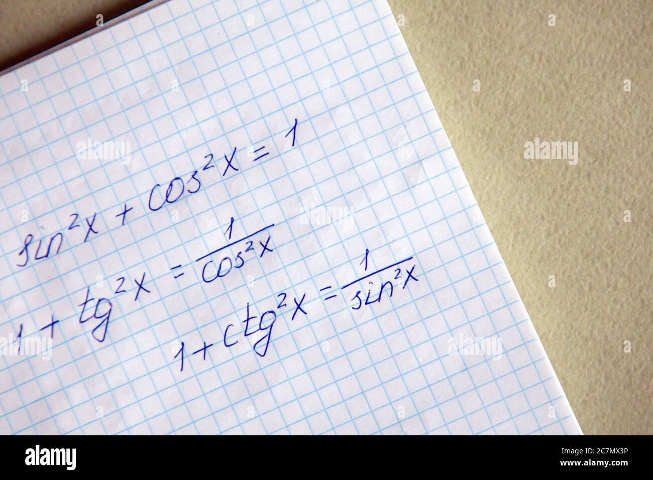 Copybook with math formulas in it- the concept of distance education ...