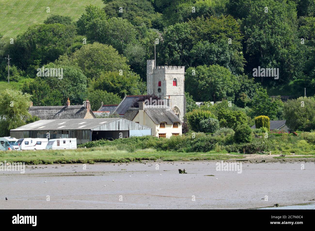 Axmouth form opposite bank of River Axe, Devon, England, Great Britain ...