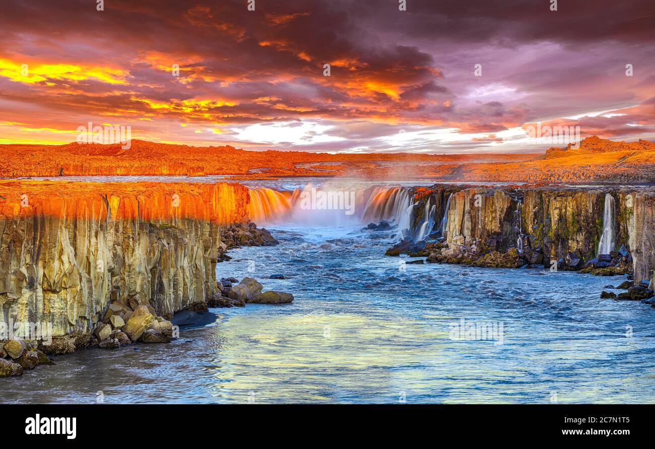 Dramatic sunset view of fantastic waterfall and cascades of Selfoss ...