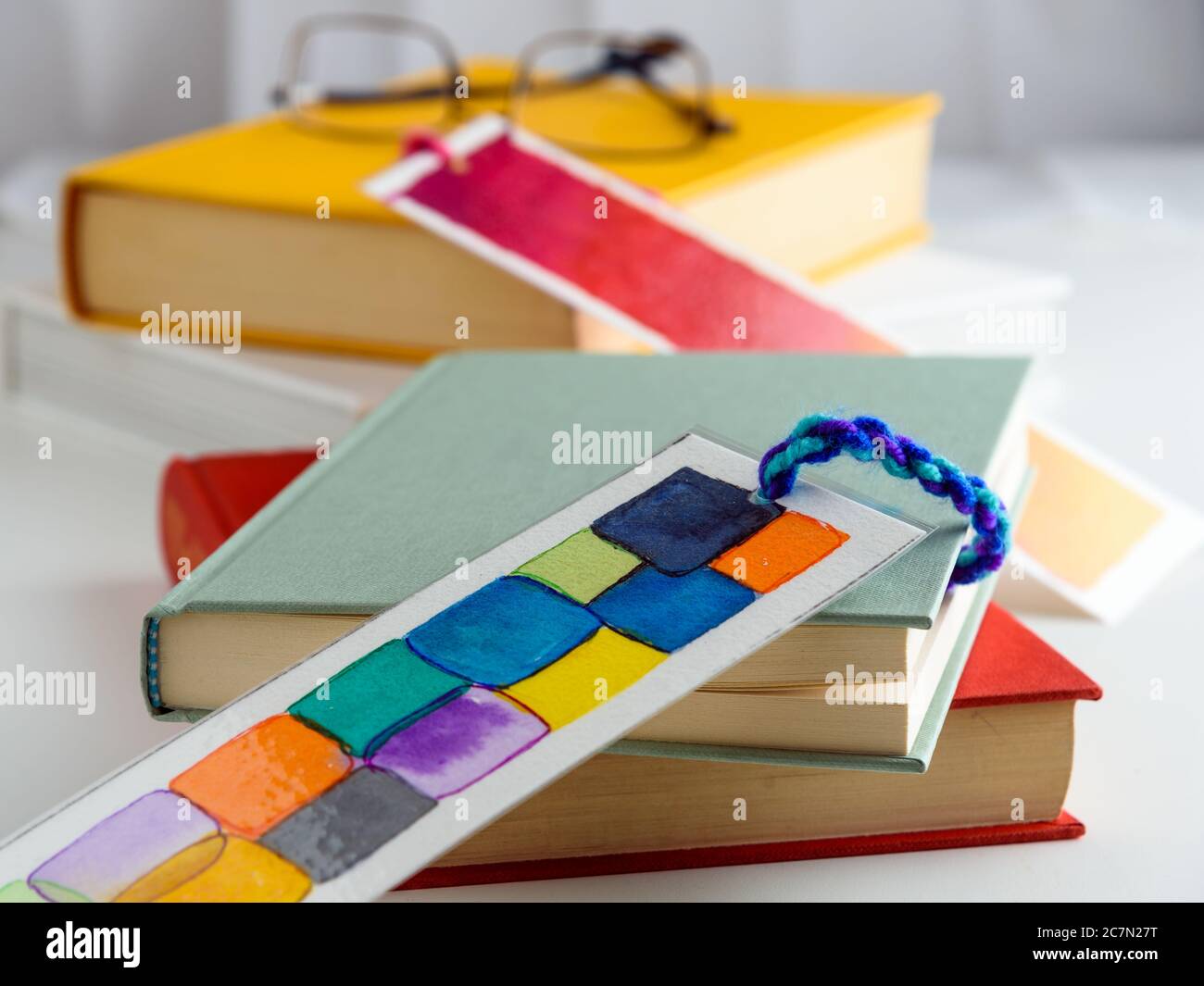 colorful bookmark on a closed green book. education. reading Stock ...
