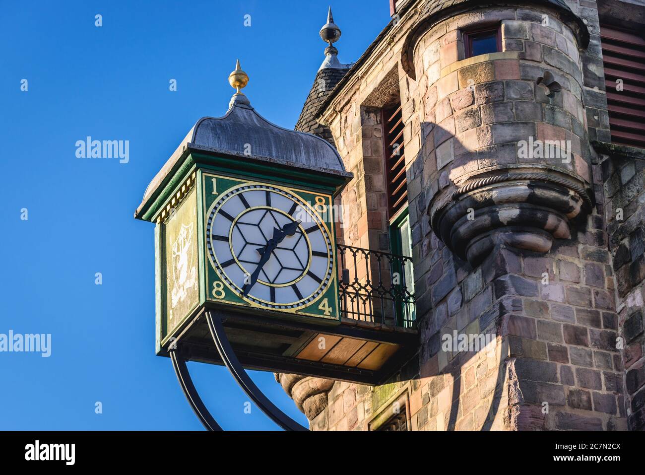 Clock on historic Canongate Tolbooth building on Canongate Street in ...