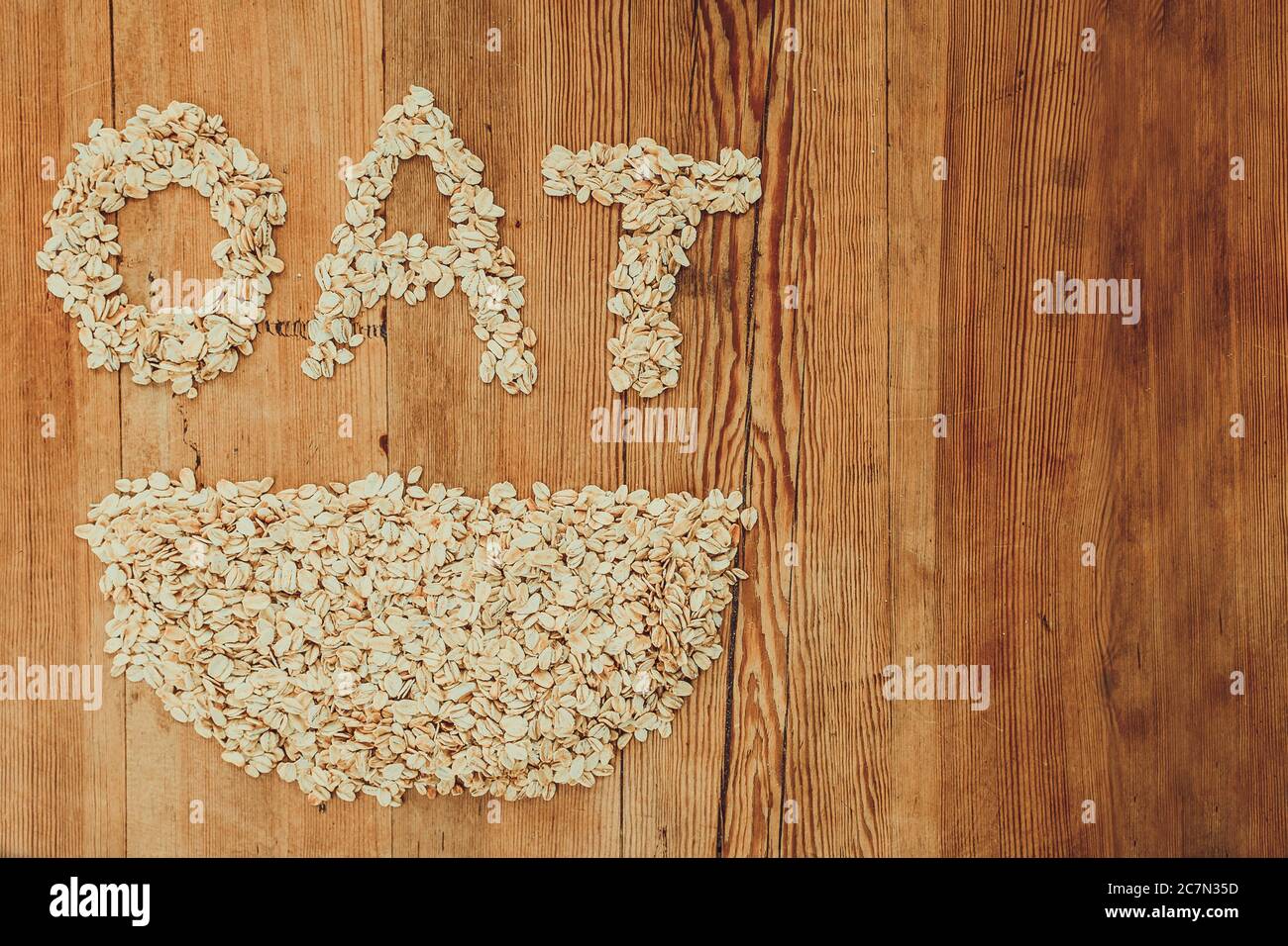 Word "oat" over a bowl-shaped figure made with oatmeal grains Stock ...