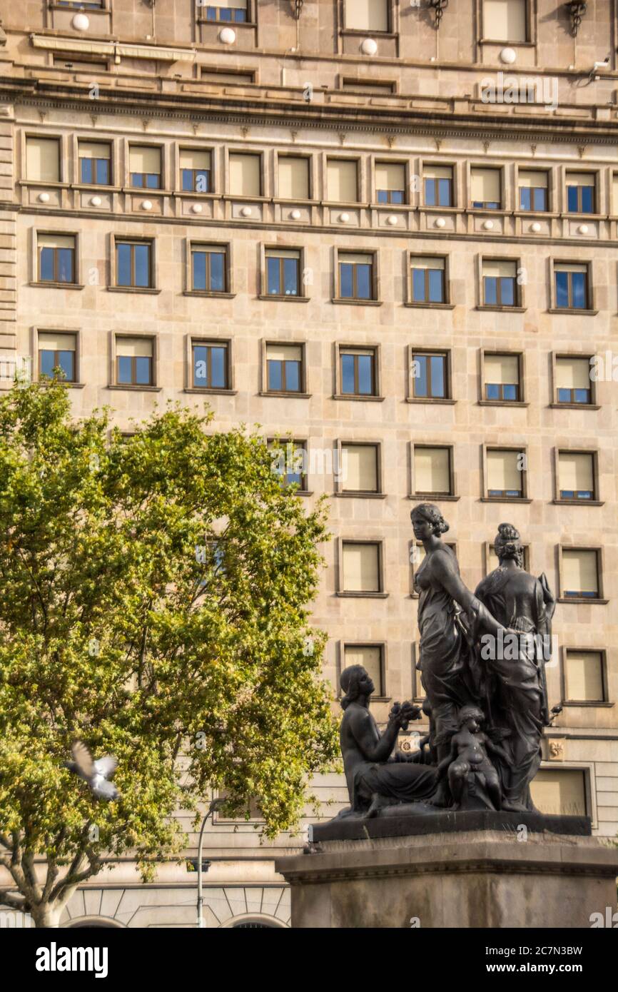Statues, buildings and fauna dot the landscape of the Cataluna Plaza in ...