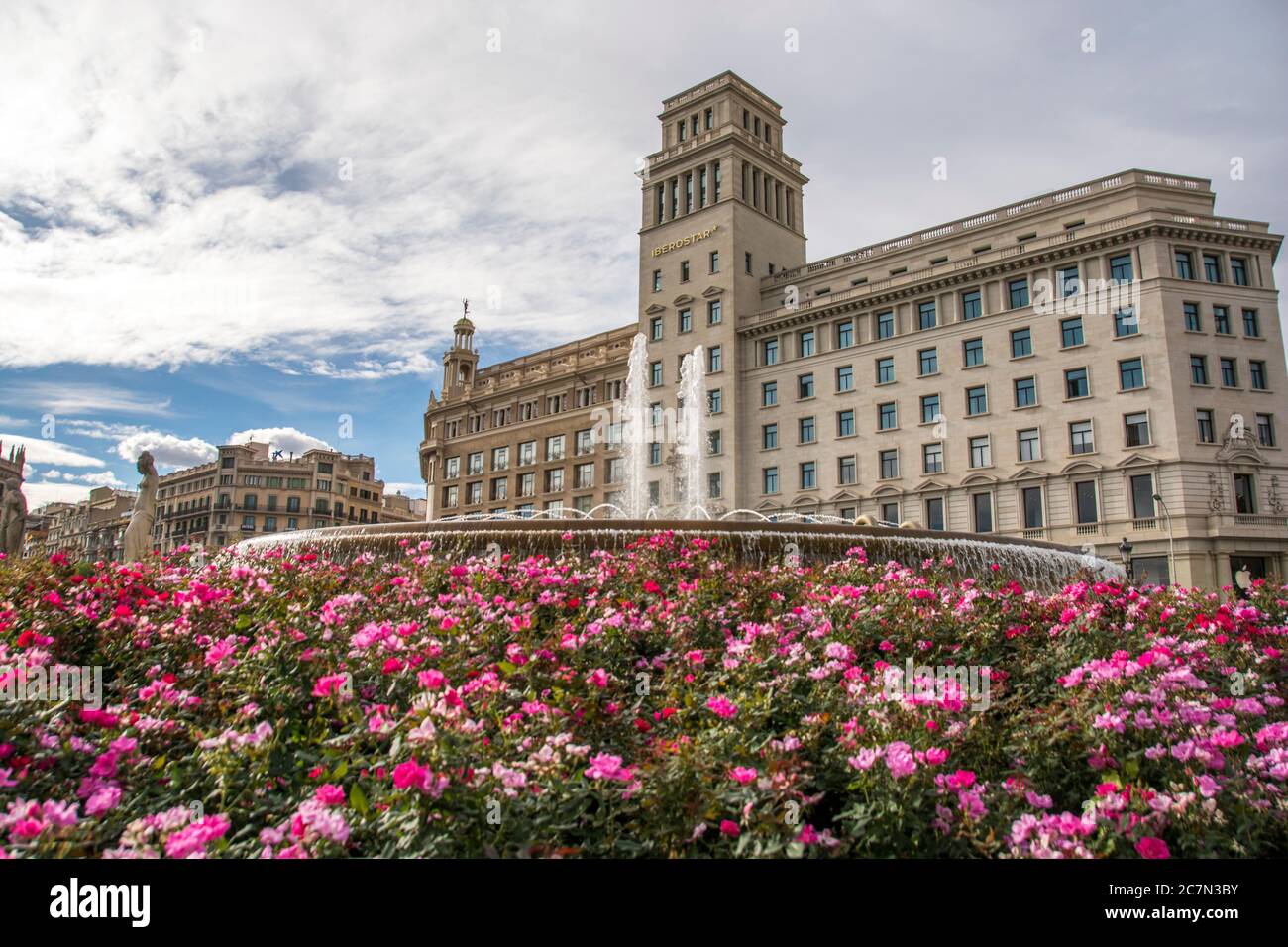 Statues, buildings and fauna dot the landscape of the Cataluna Plaza in ...