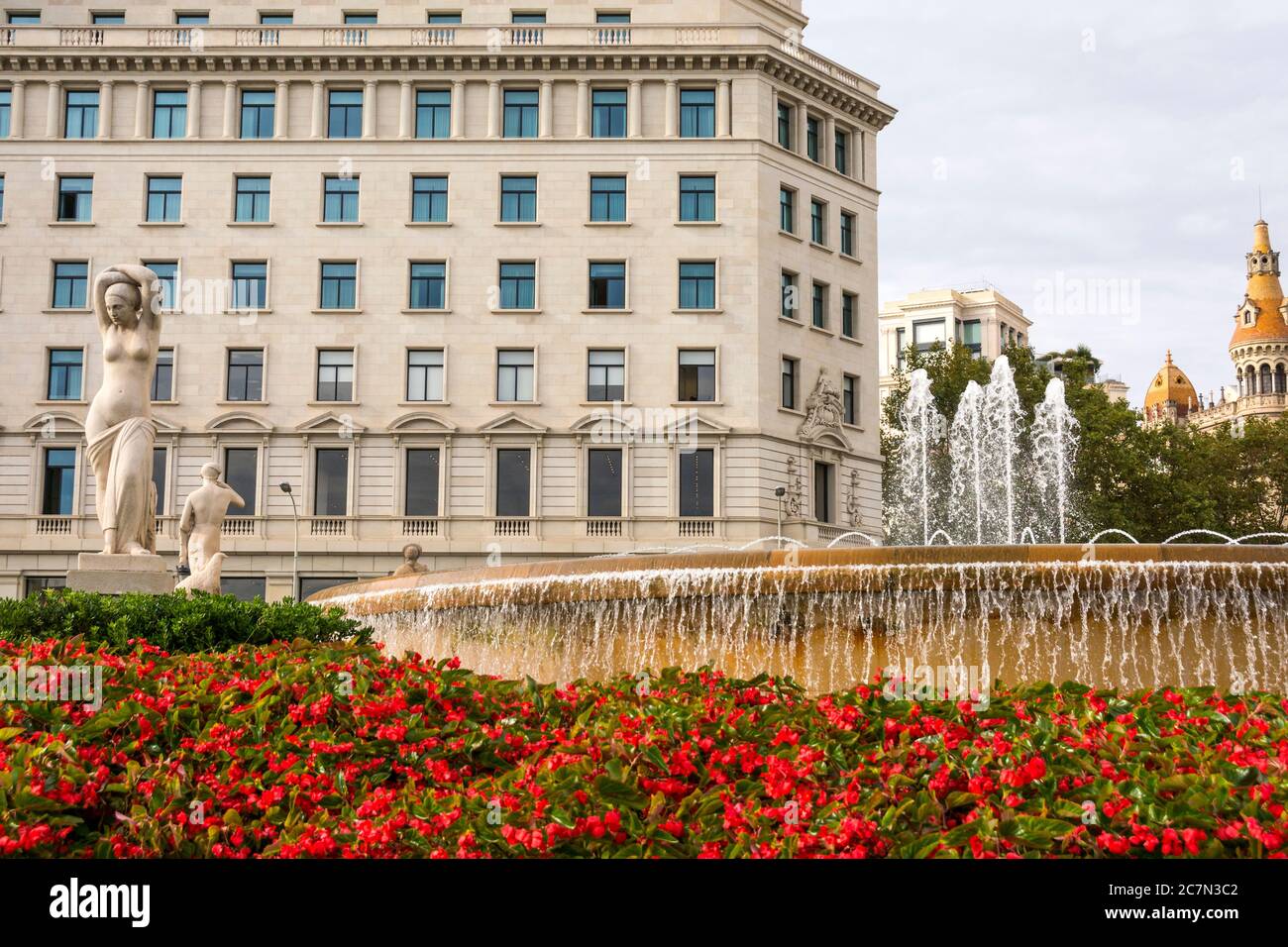 Statues, buildings and fauna dot the landscape of the Cataluna Plaza in ...