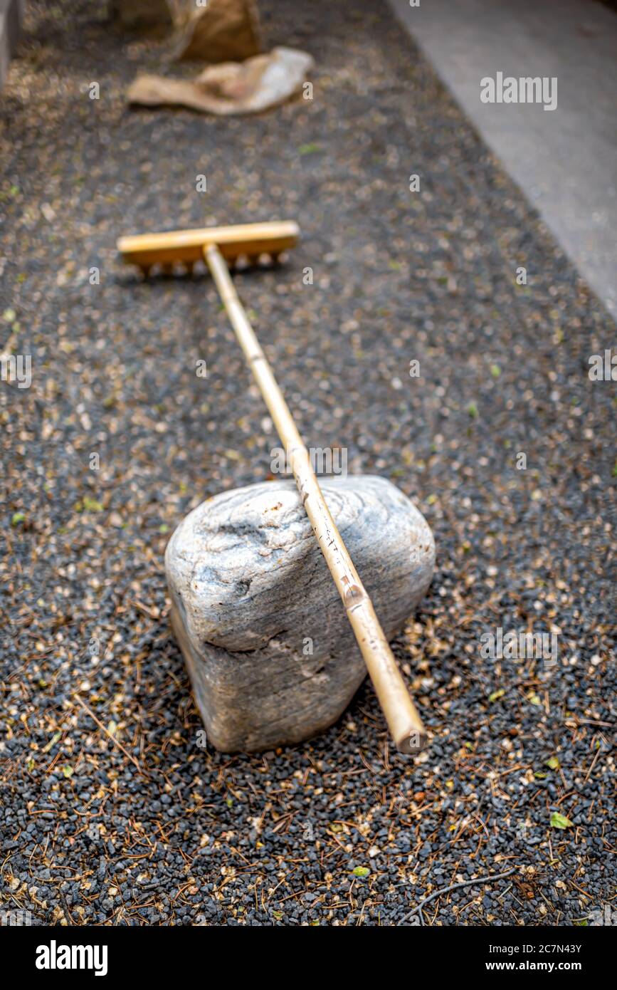 Outdoor small zen rock garden in Japan temple with rake closeup on ...