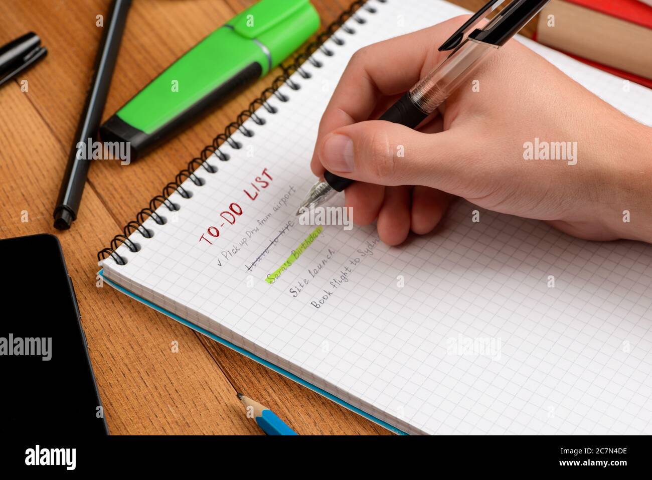 Making a to do list. Writing tasks and reminders Stock Photo - Alamy